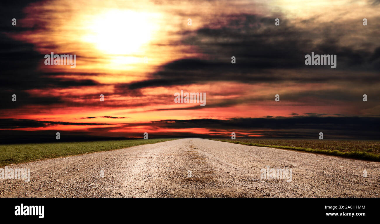 a fantastic desert road with clouds Stock Photo - Alamy