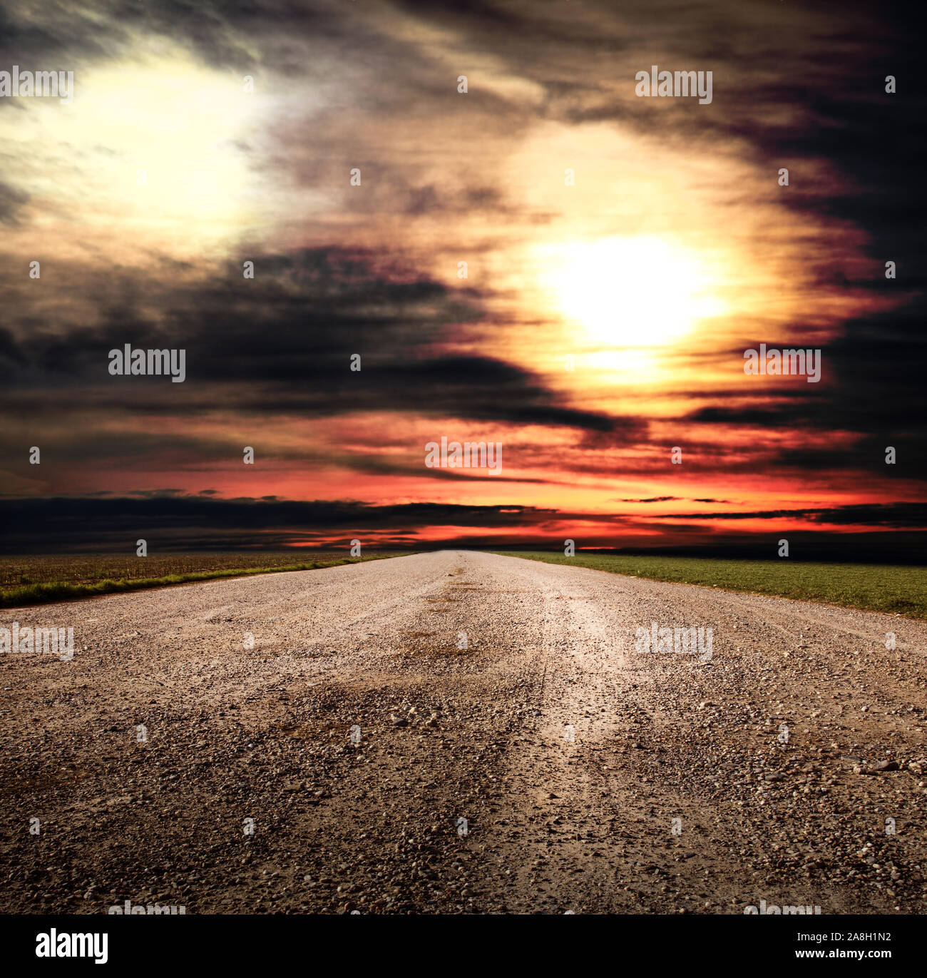 a fantastic desert road with clouds Stock Photo - Alamy