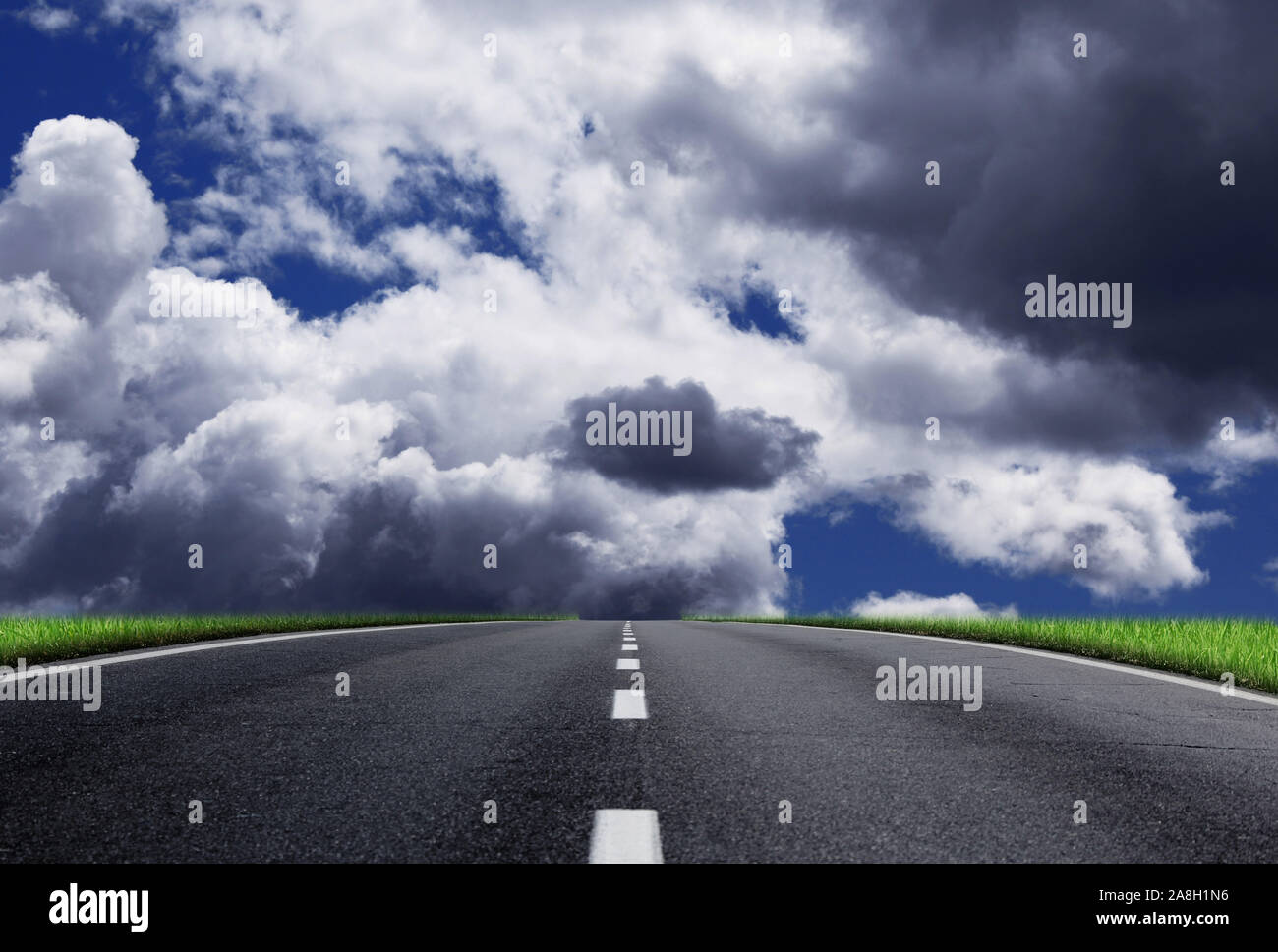 a fantastic desert road with clouds Stock Photo - Alamy