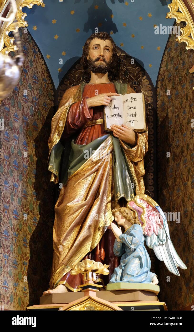 St. Matthew the Evangelist statue on the main altar in the church of ...
