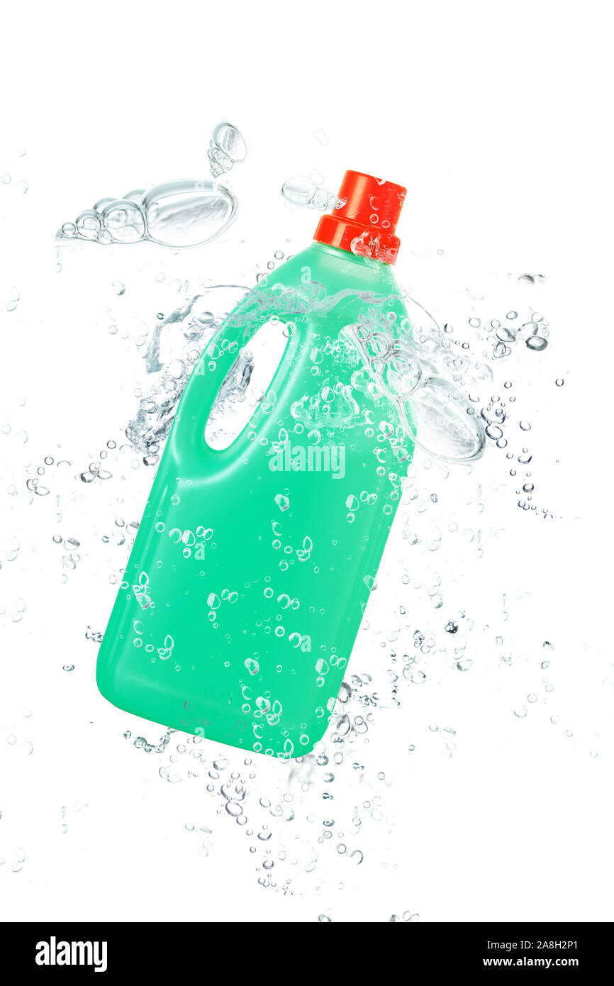 green plastic bottle falling in water Stock Photo - Alamy