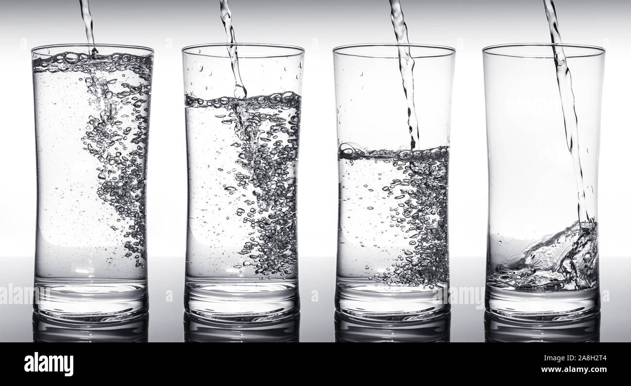 Four glasses of water hi-res stock photography and images - Alamy