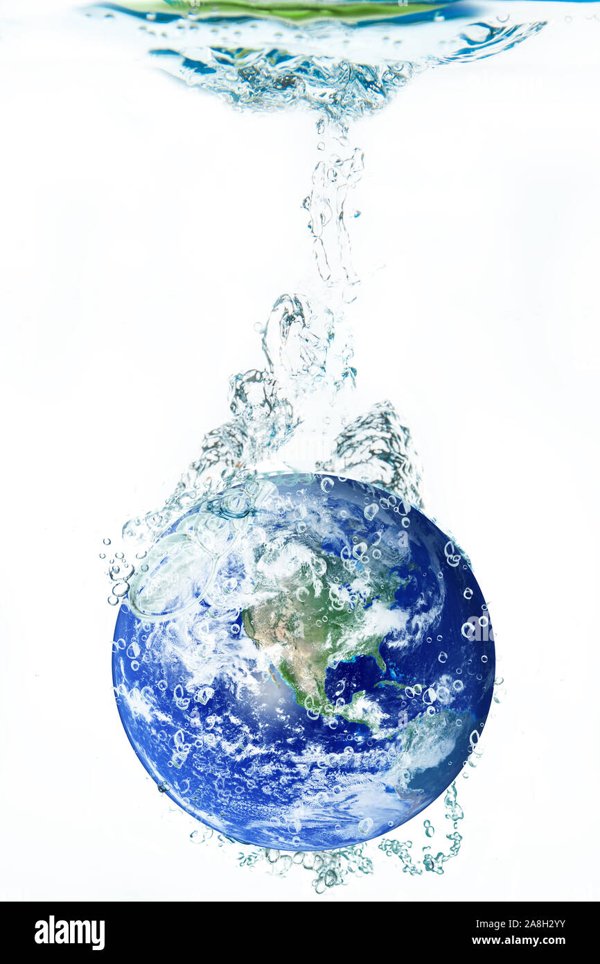 litlle Earth falling in water Stock Photo - Alamy