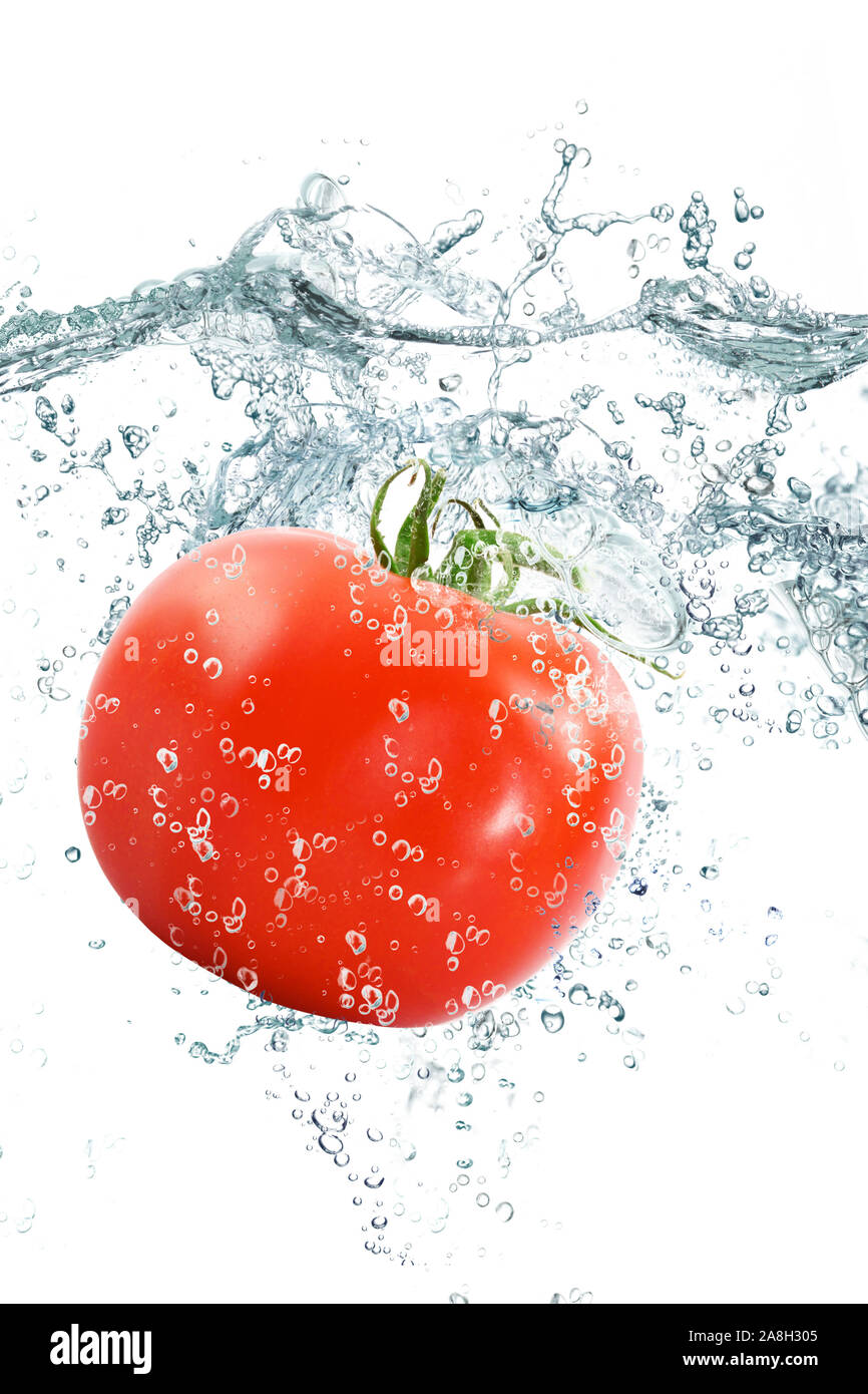 fresh tomato falling in pure water Stock Photo - Alamy