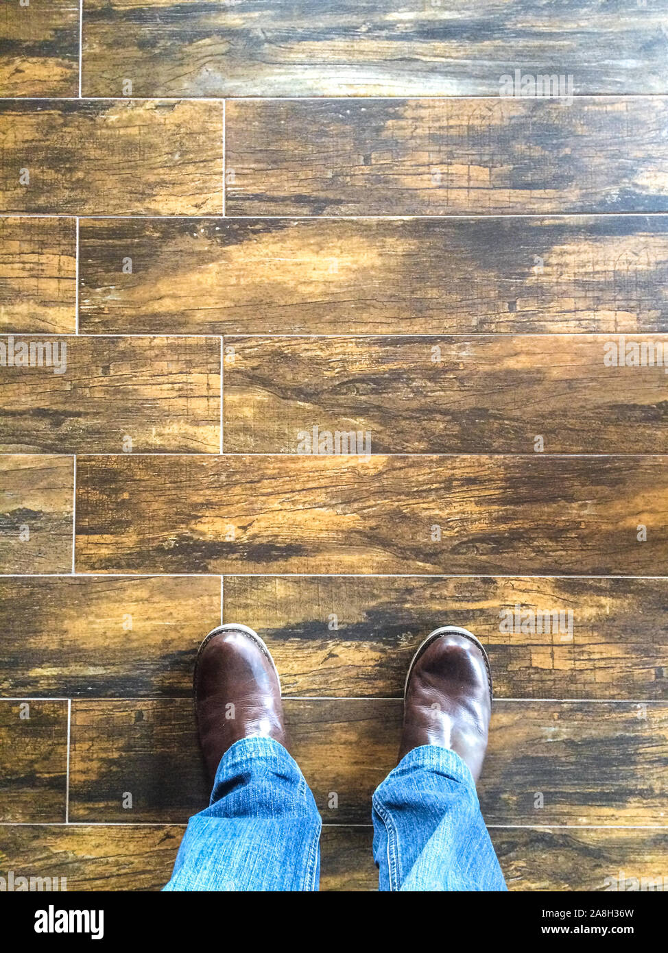 standing on a wood floor Stock Photo - Alamy