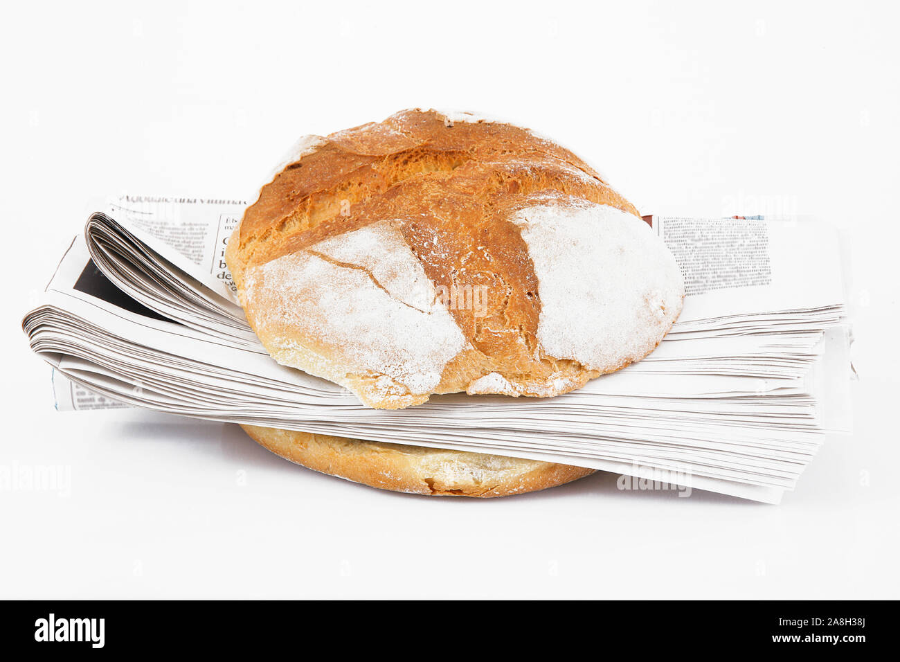 sandwich with newspaper on white background Stock Photo - Alamy