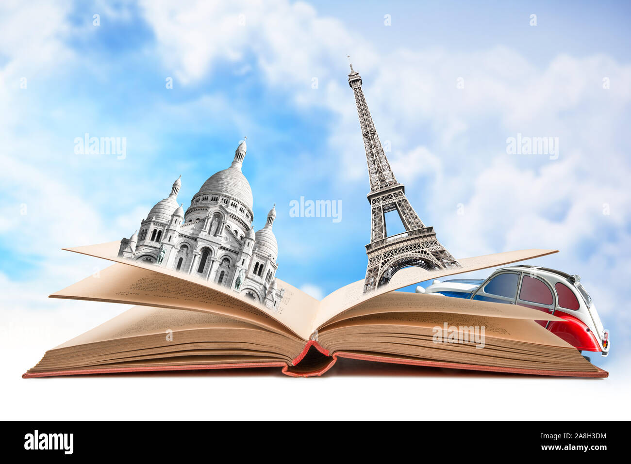 Open Book with monuments of Paris Stock Photo - Alamy