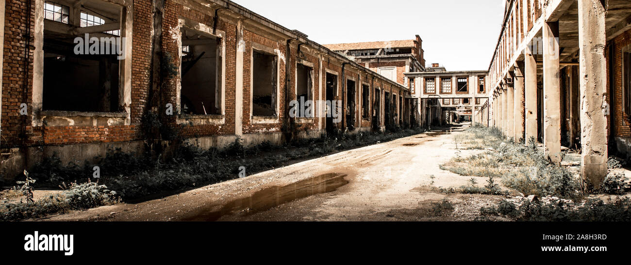 a desolate abandoned factory view Stock Photo - Alamy