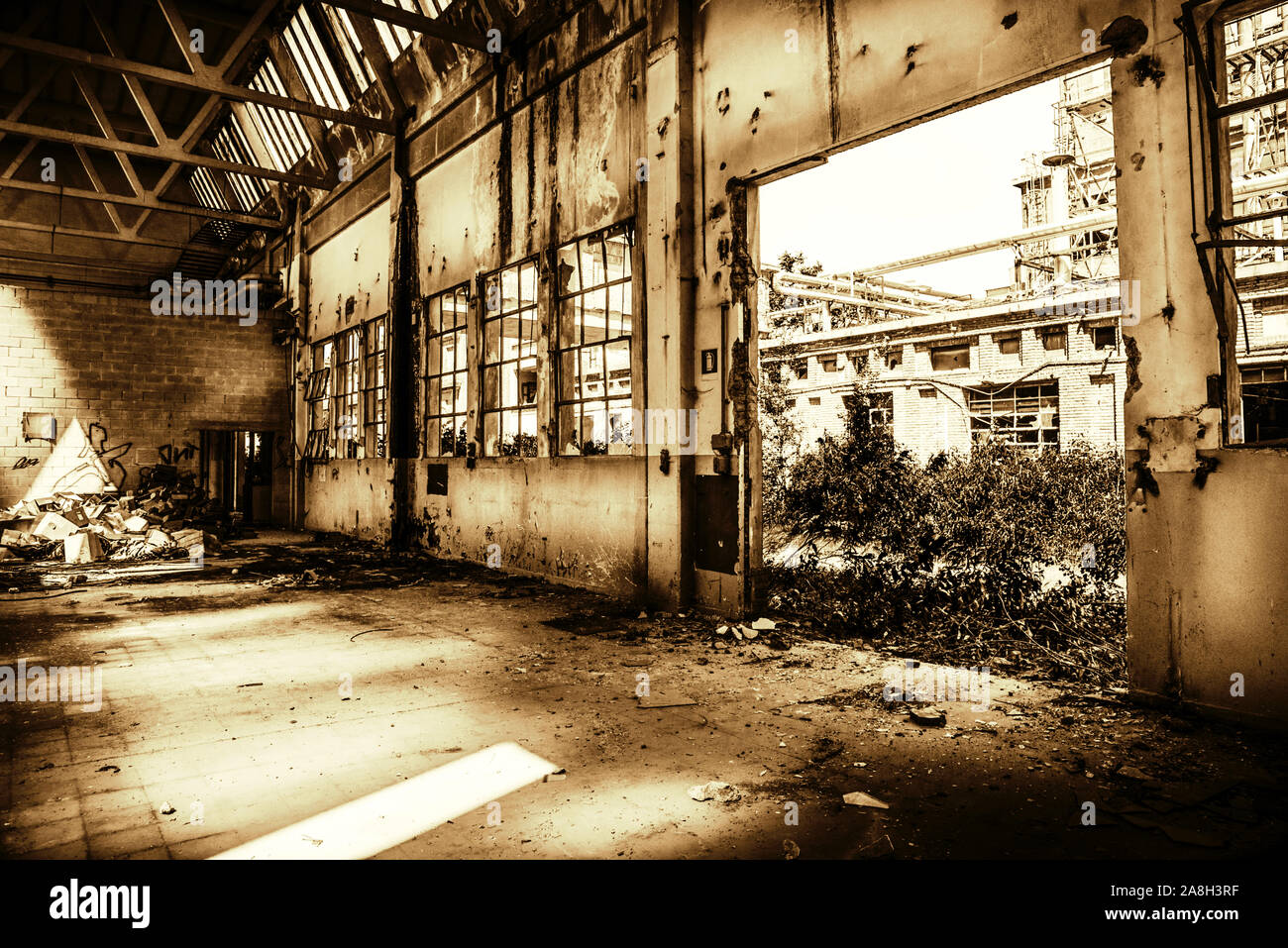 a desolate abandoned factory view Stock Photo - Alamy