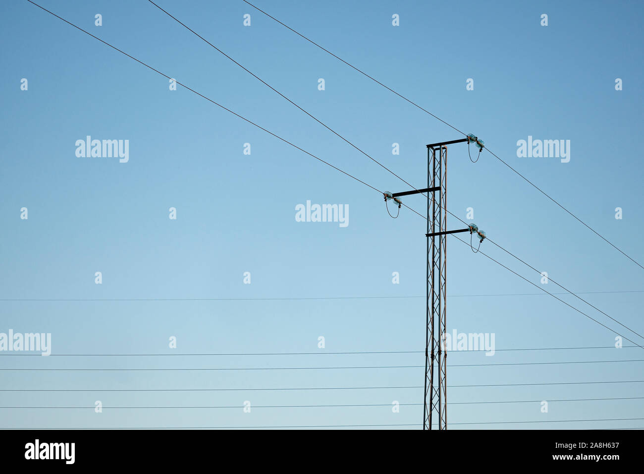 wiring and connection elements in an electricity turret on blue sky ...
