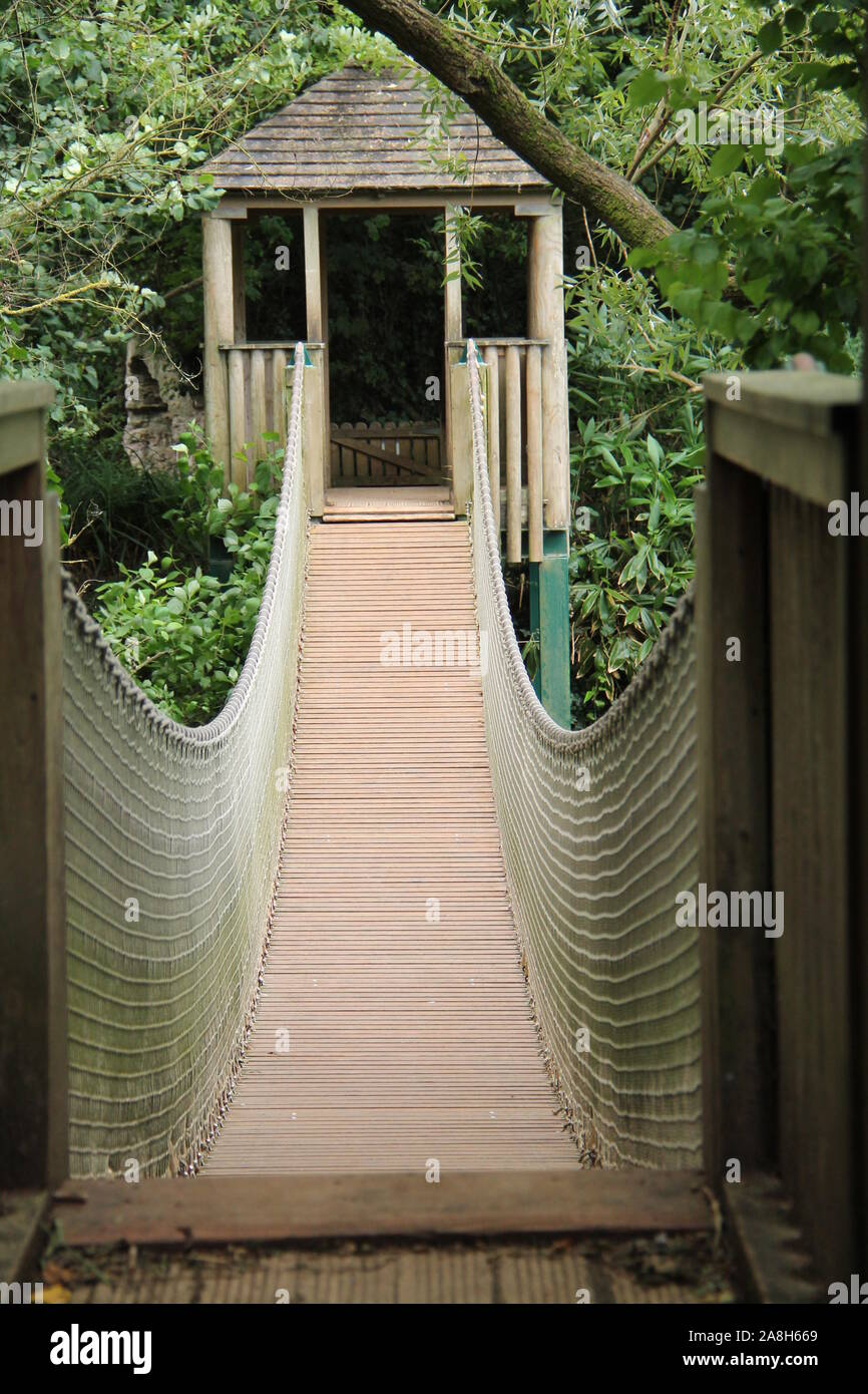 A Wooden Rope Suspended Bridge in a Woodland Area Stock Photo - Alamy