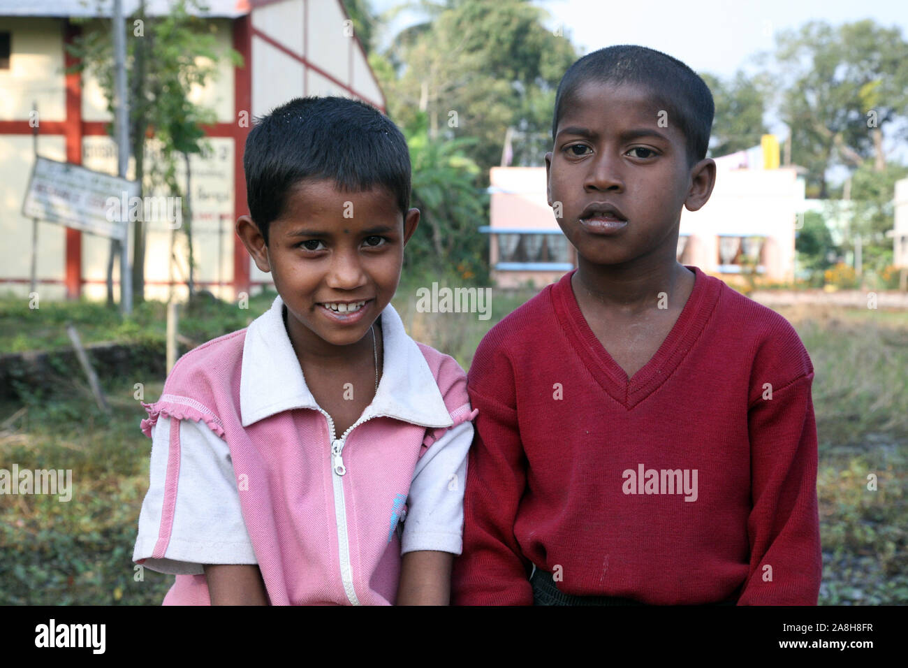 Portrait of tribal children in a village Kumrokhali, India Stock Photo ...