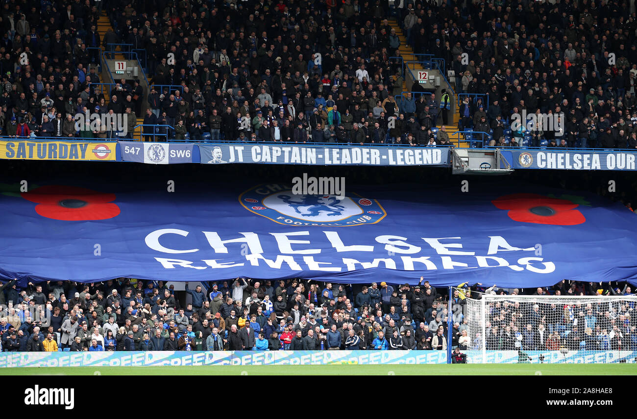 A banner with 'Chelsea Remembers' is passed along the fans during the ...