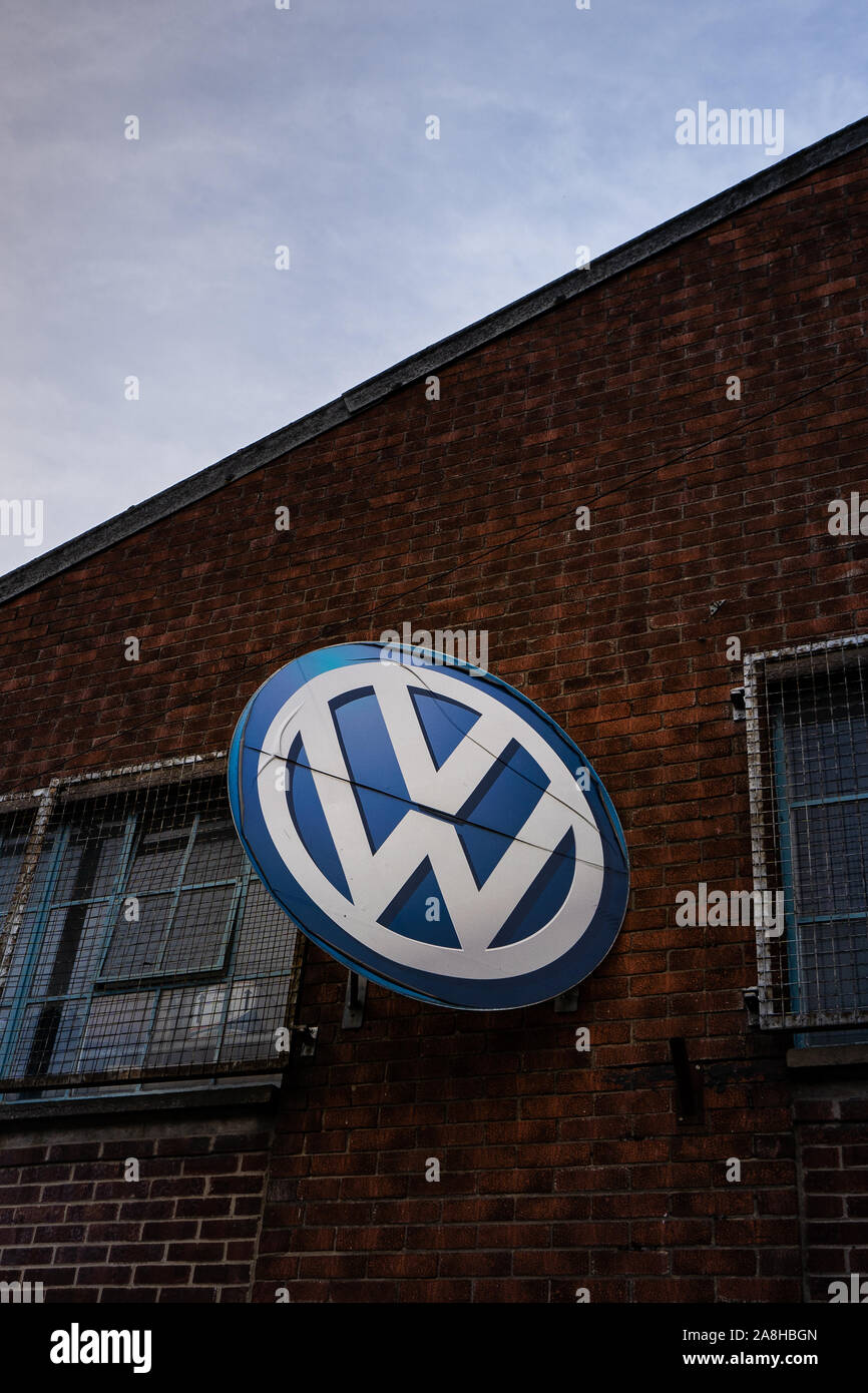 A VW sign Volkswagen transportation sign on a warehouse in the city ...