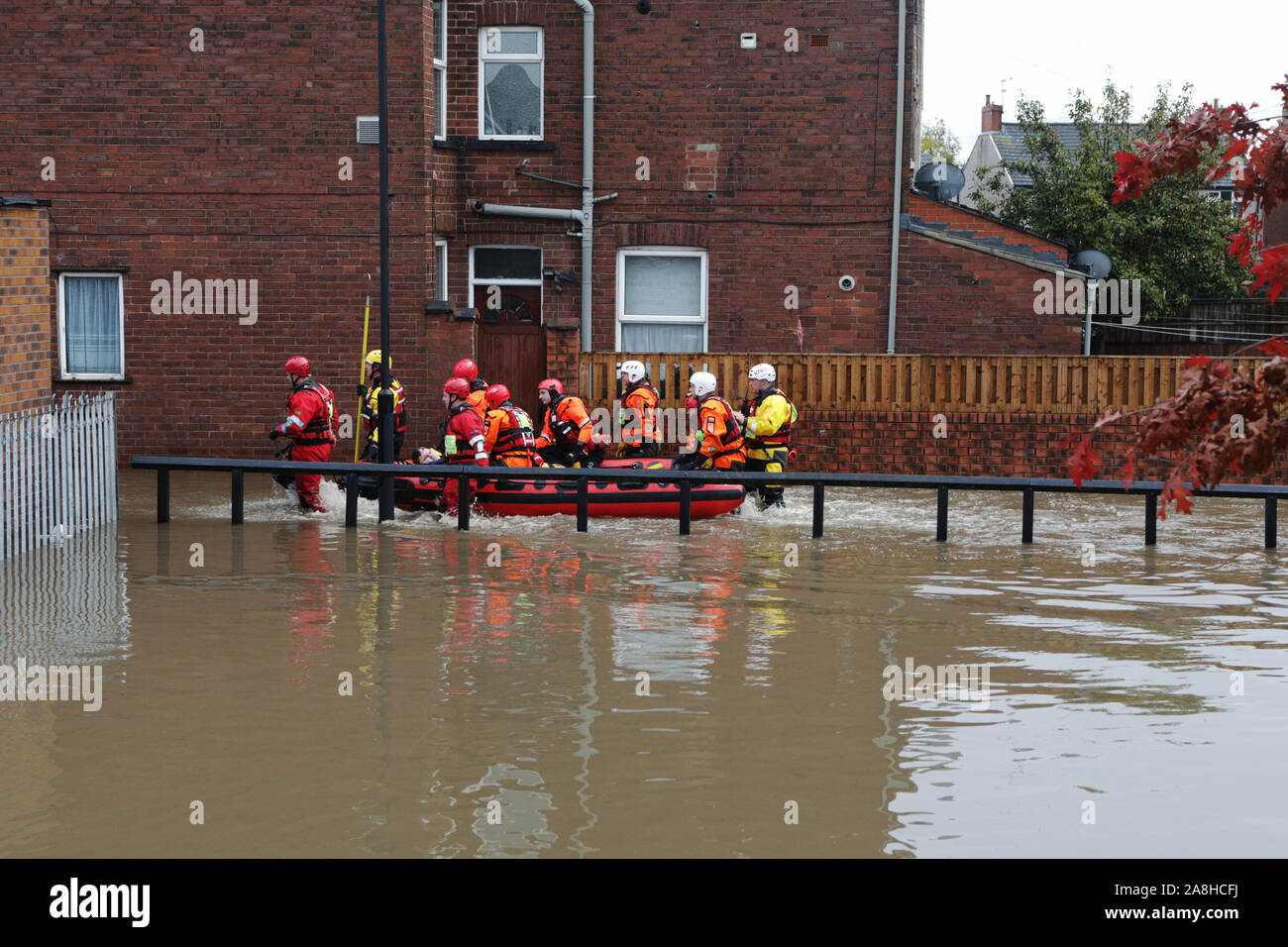 Fire and rescue services evacuate a disabled man from his home after ...