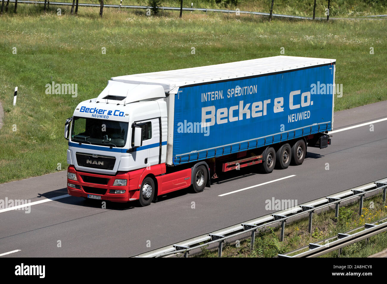 Becker & Co. MAN truck with curtainside trailer on motorway Stock Photo ...