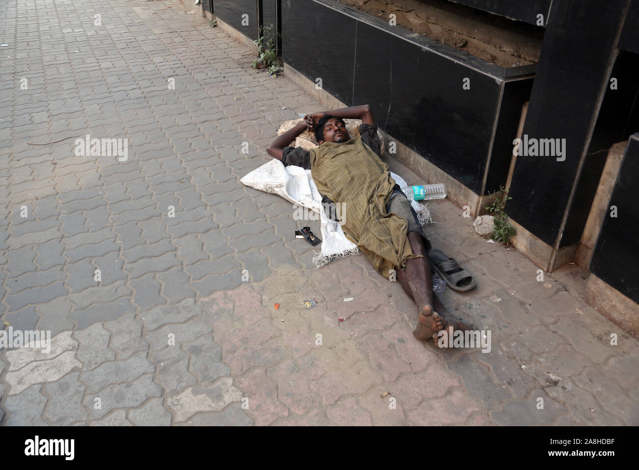 Homeless people sleep on footpath hi-res stock photography and images ...