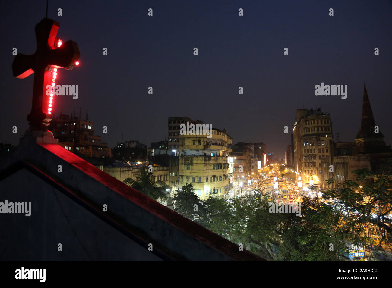 Dark city traffic blurred in motion at late evening on crowded streets ...