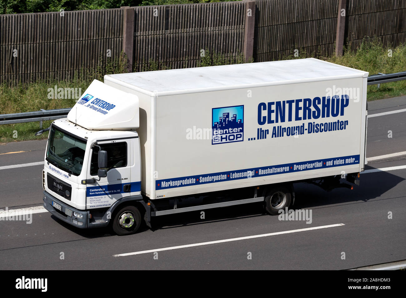 Centershop MAN TGL truck on motorway Stock Photo - Alamy