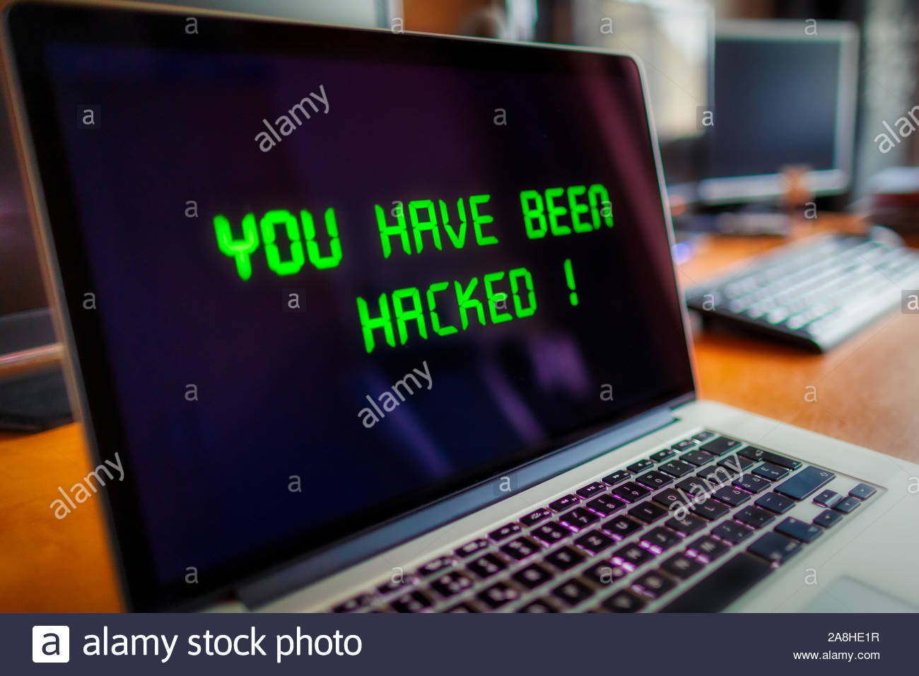 Hacked Message On Computer Screen Stock Photos & Hacked Message On ...