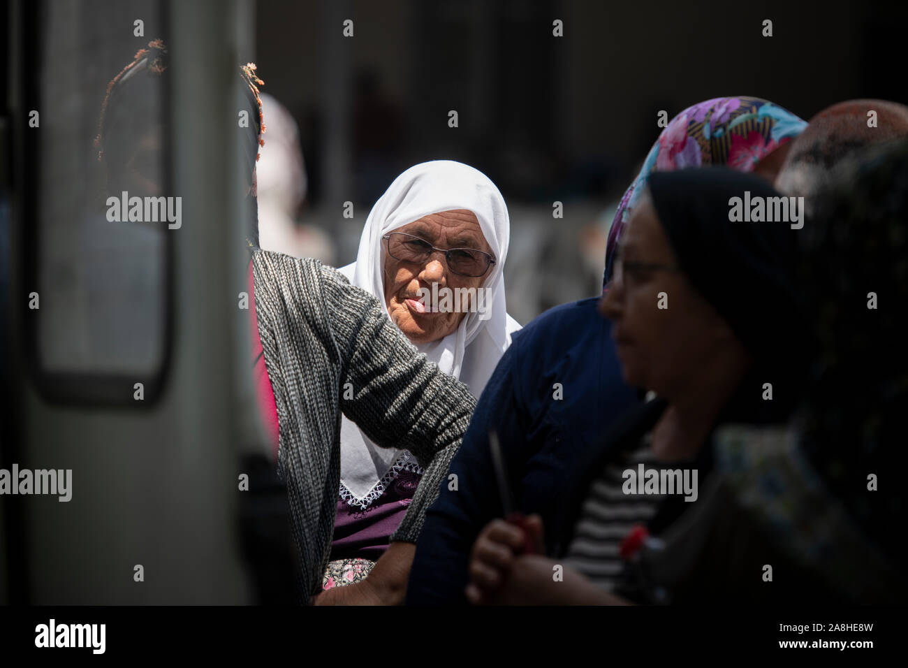A beautiful, elderly lady living a semi nomadic lifestyle in a village ...