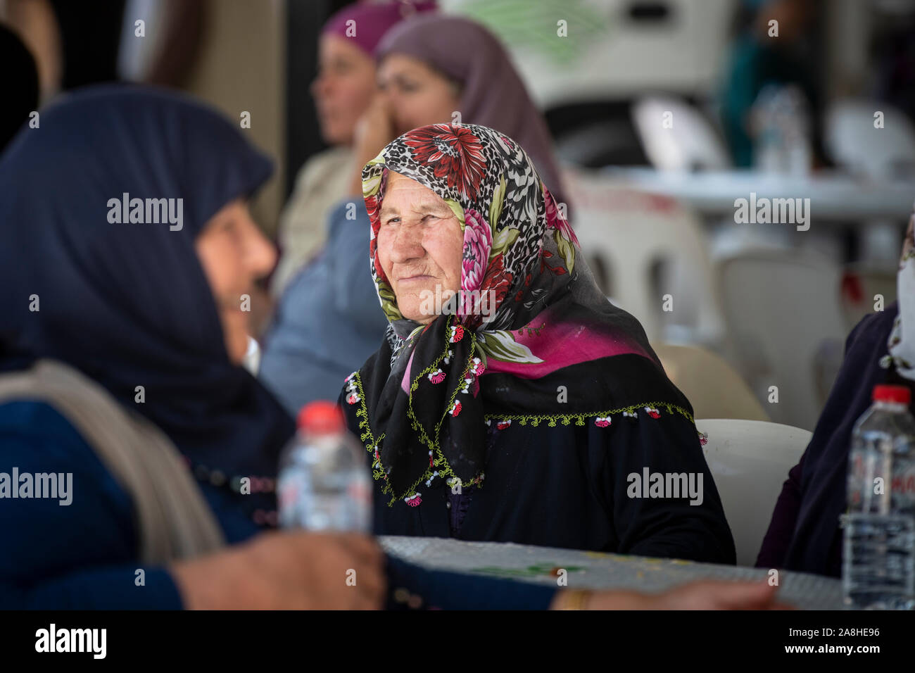 A beautiful, elderly lady living a semi nomadic lifestyle in a village ...