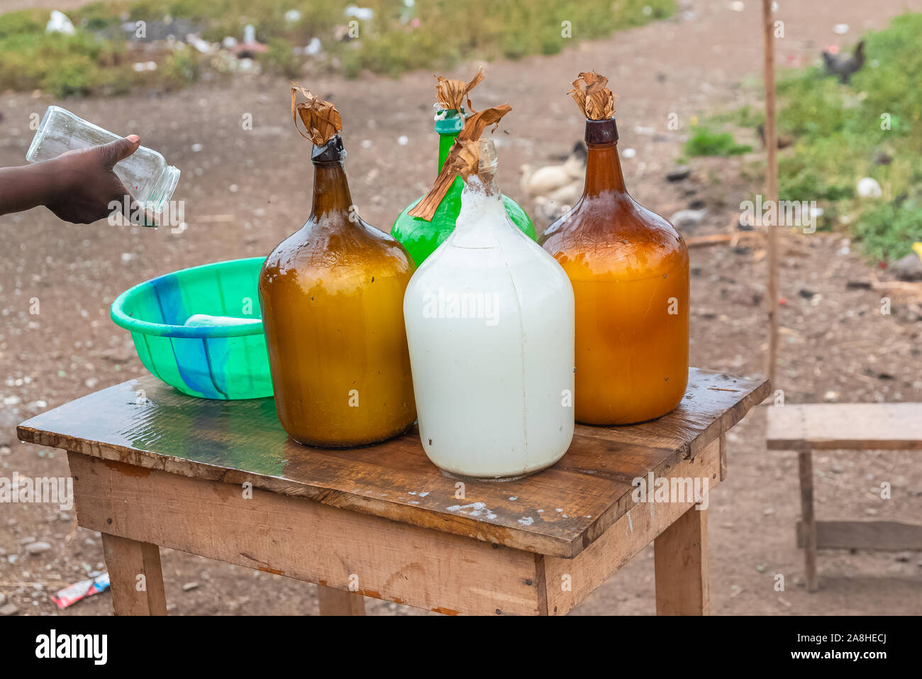 Palm wine in bottles sold in a village, Sao Tome and Principe Stock ...