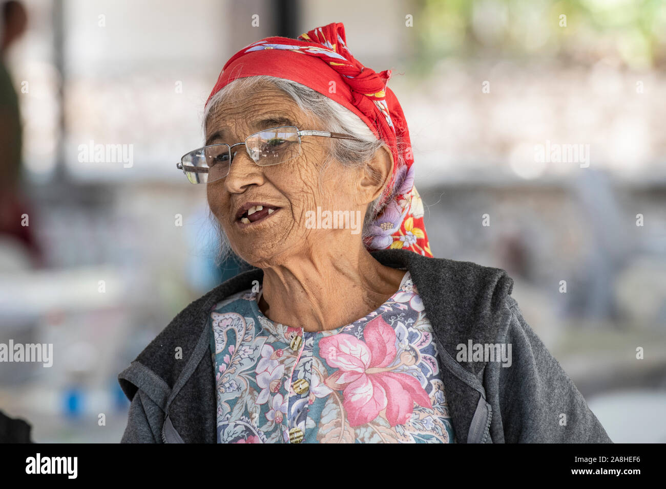 A beautiful, elderly lady with missing teeth living a semi nomadic ...