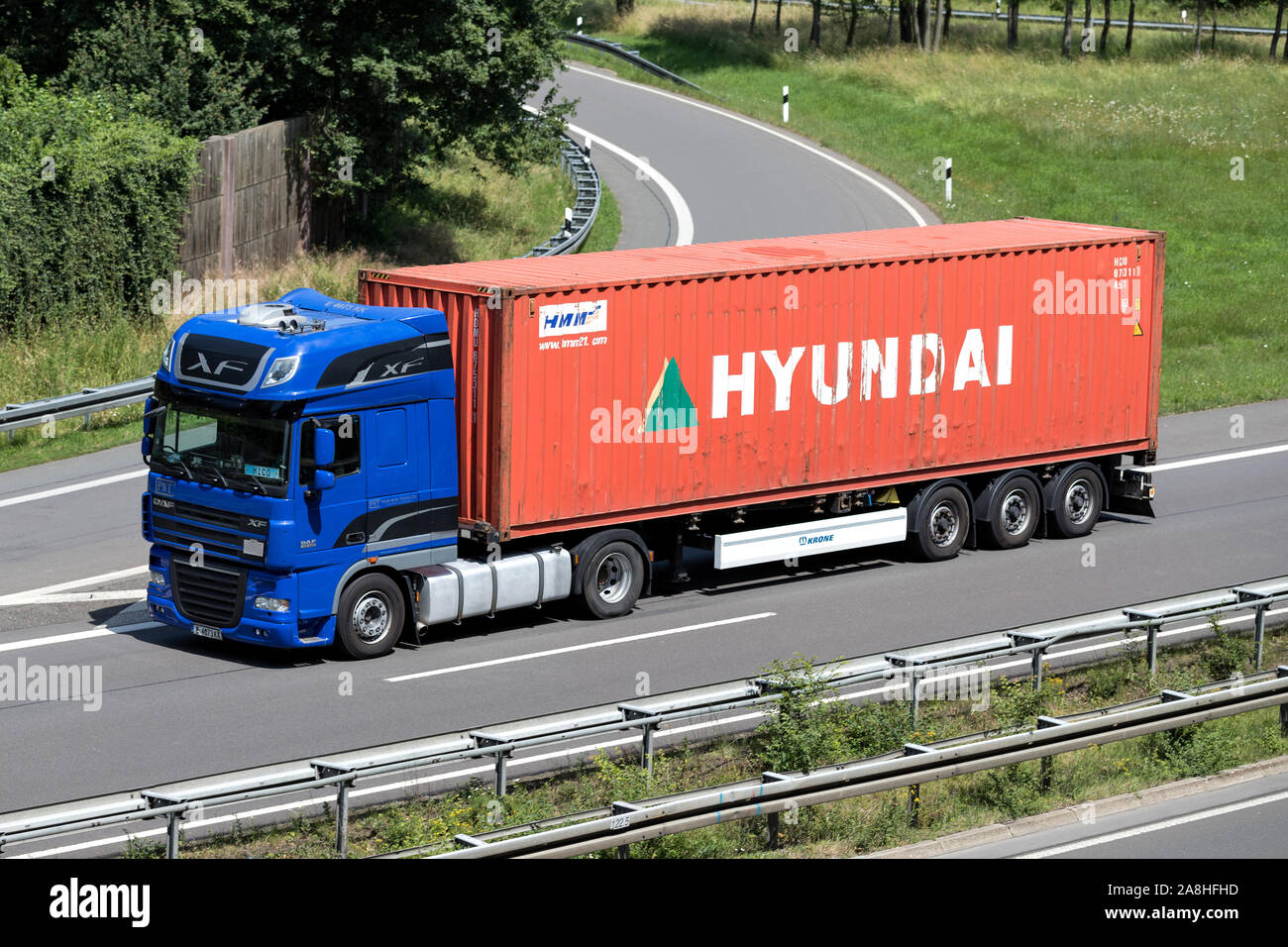 DAF XF truck with Hyundai container on motorway Stock Photo - Alamy