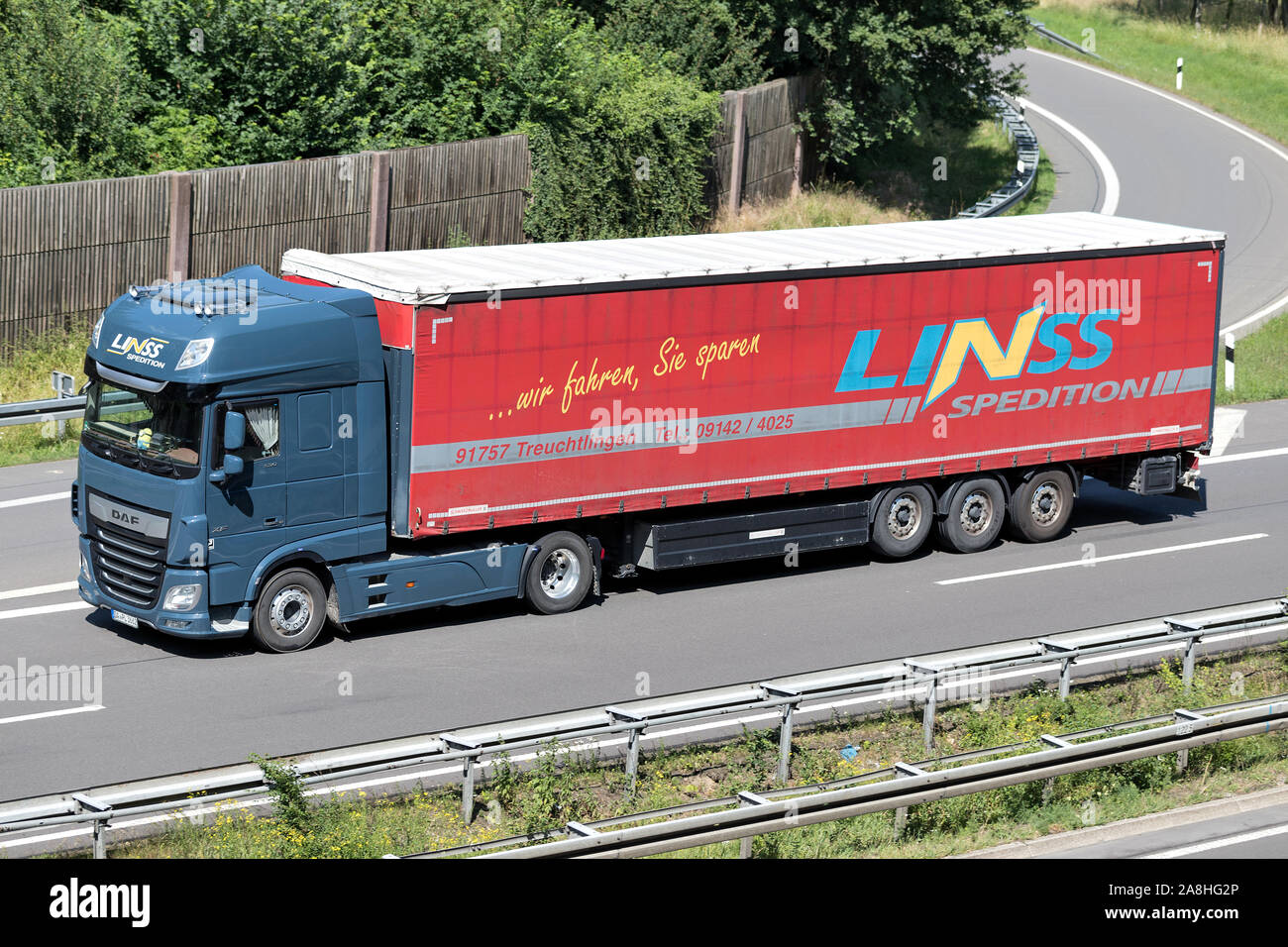 Linss DAF XF truck with curtainside trailer on motorway Stock Photo - Alamy
