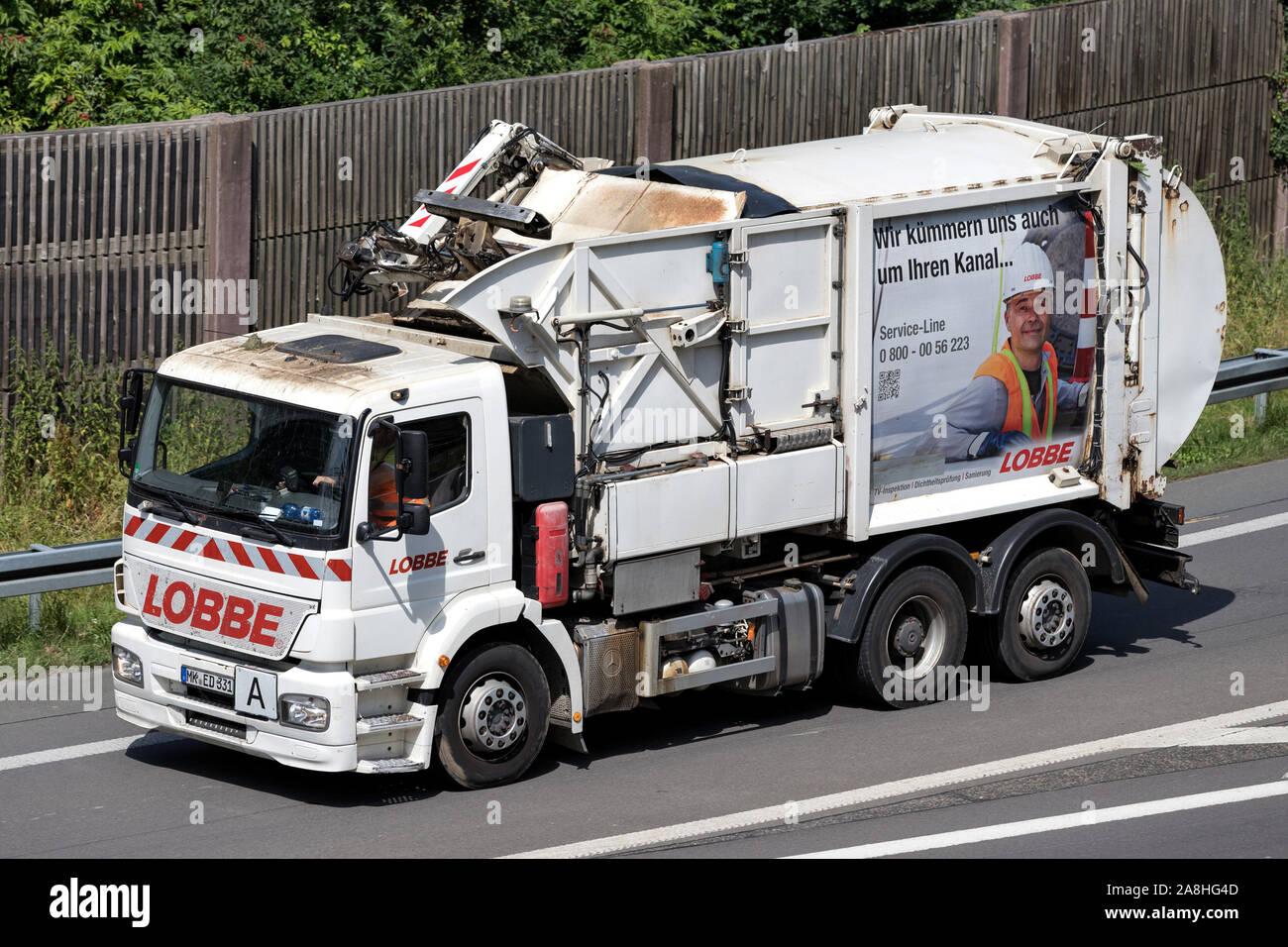 Disposal lorry hi-res stock photography and images - Alamy
