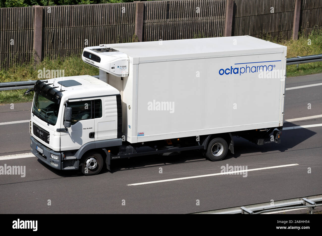 Octapharma MAN TGL truck on motorway Stock Photo - Alamy