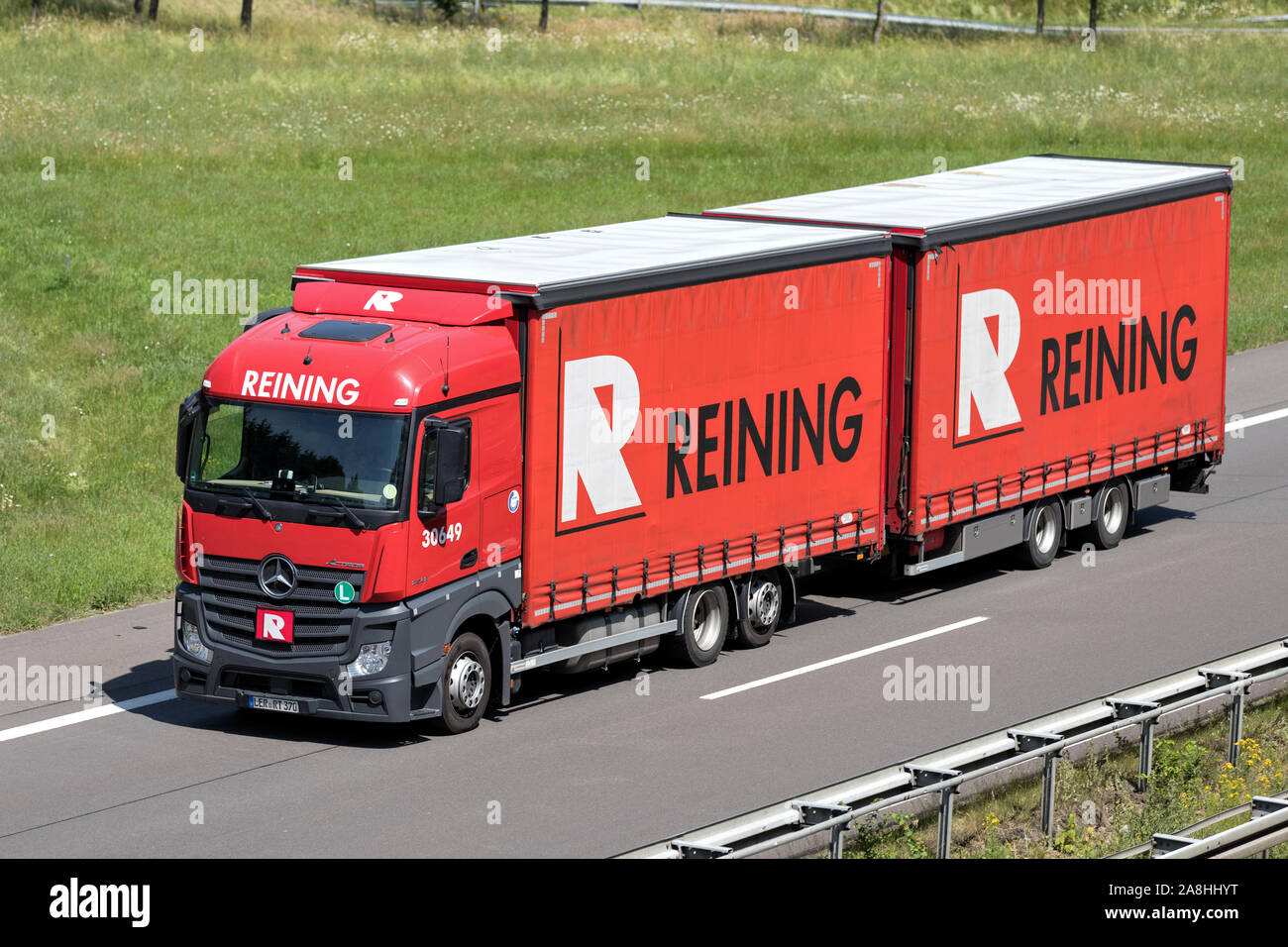 Reining Mercedes-Benz Actros combination truck on motorway Stock Photo ...