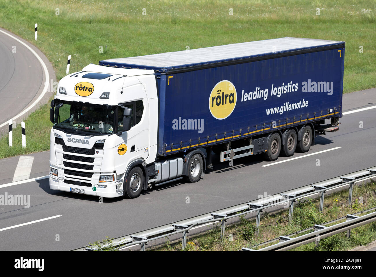 Rotra Scania truck with curtainside trailer on motorway Stock Photo - Alamy