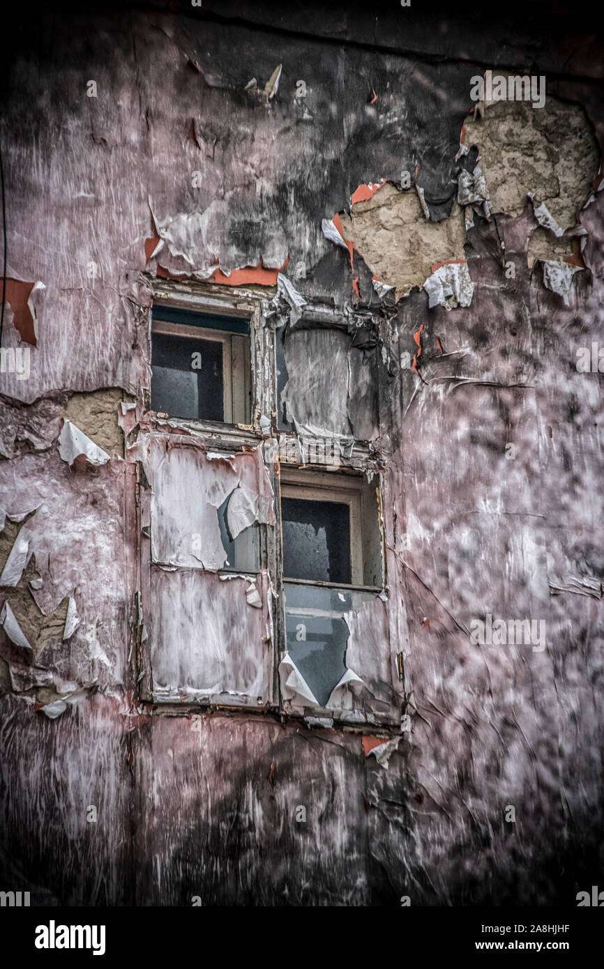 A ruined window on an old abandoned building Stock Photo - Alamy