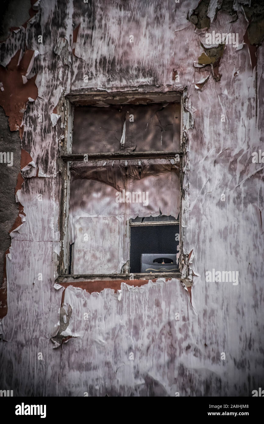 A ruined window on an old abandoned building Stock Photo - Alamy