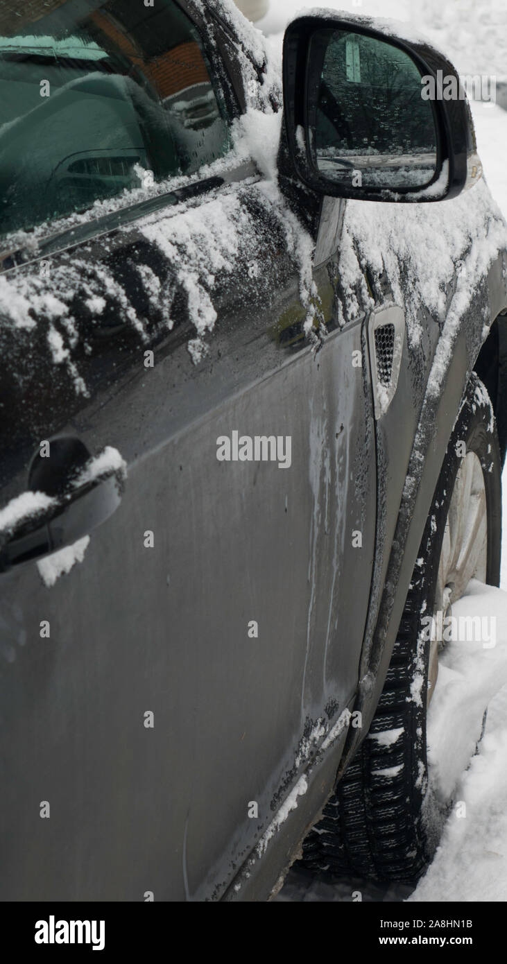 Frozen car after clearing snow from it Stock Photo - Alamy