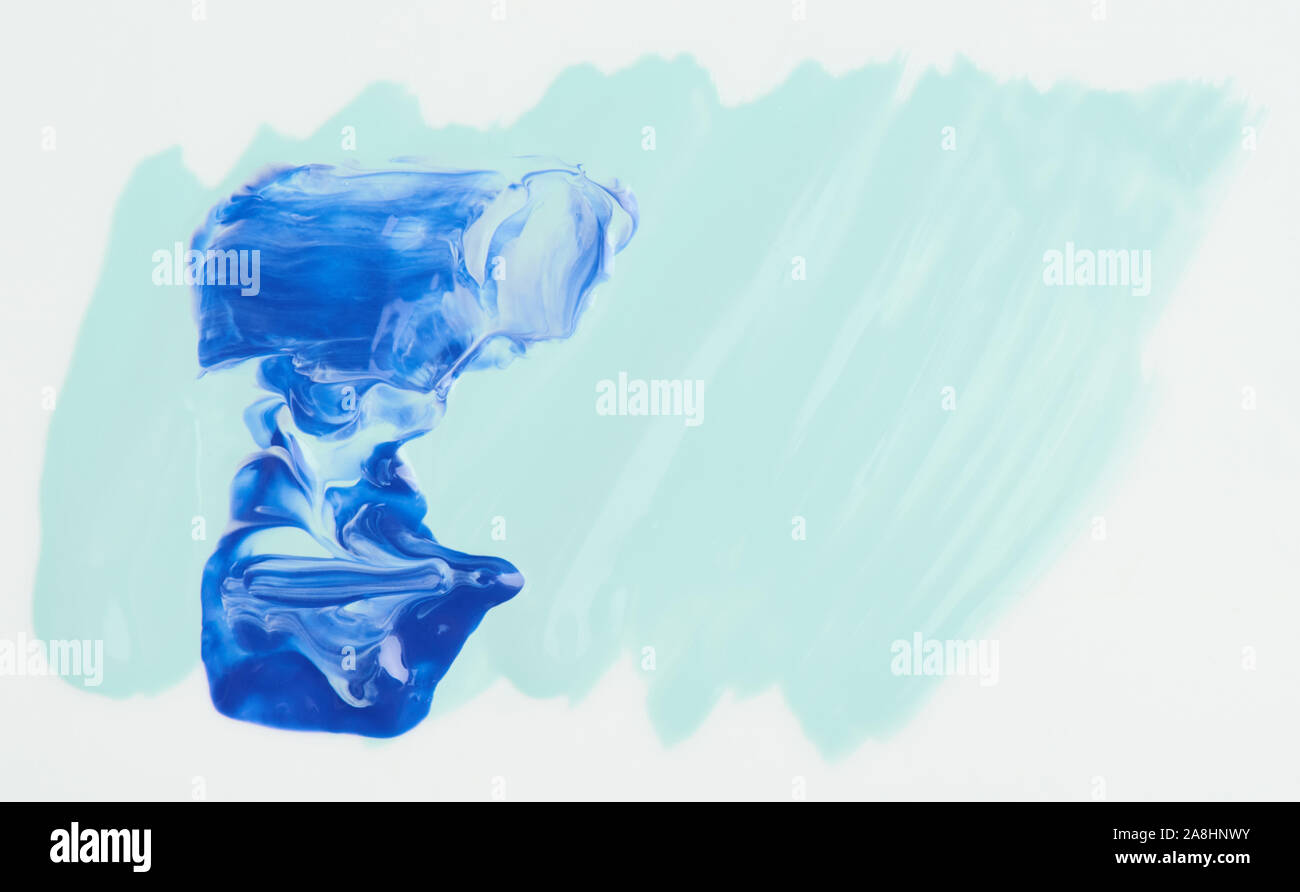 Abstract blue paint spot isolated on white background Stock Photo - Alamy