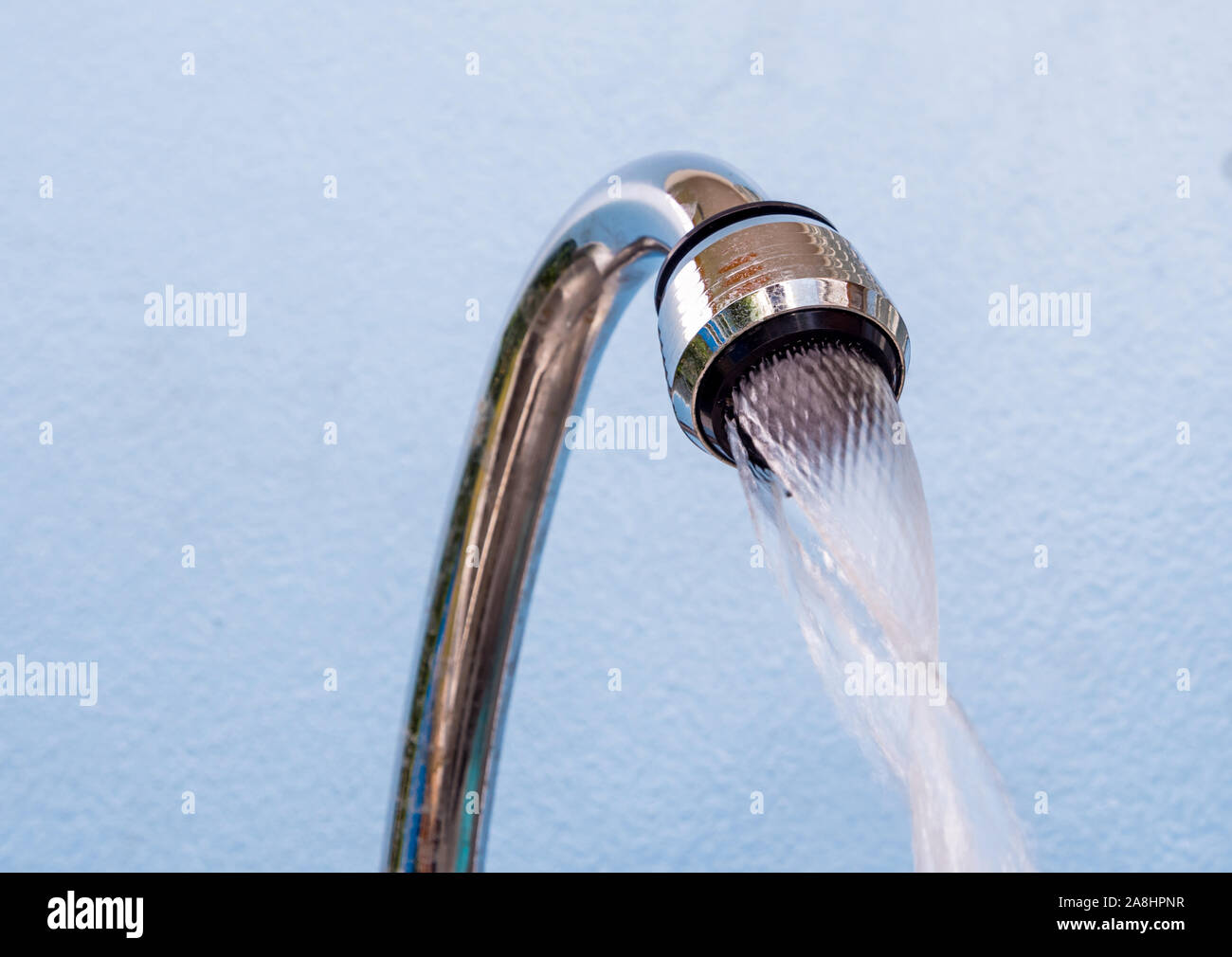 Water flowing from the stainless steel water tap Stock Photo - Alamy