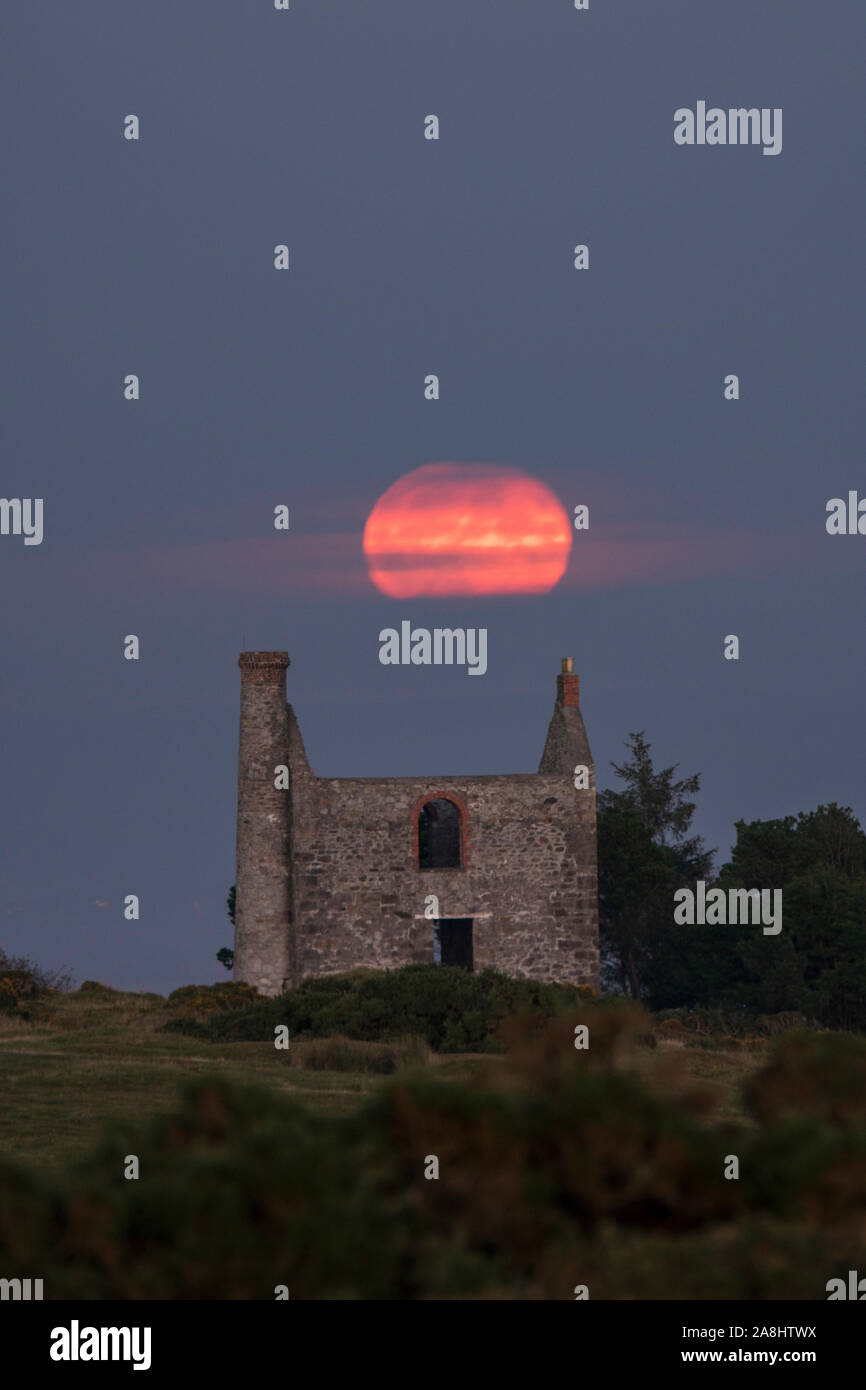 Harvest Moon rises in the sky, Cornwall, UK Stock Photo - Alamy