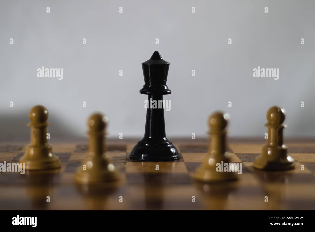 King surrounded by pawns in a game of chess. Pawns ambushing the kind ...
