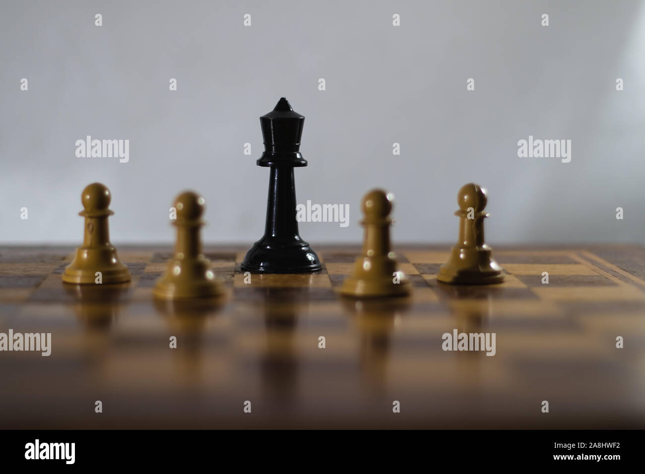 King surrounded by pawns in a game of chess. Pawns ambushing the kind ...