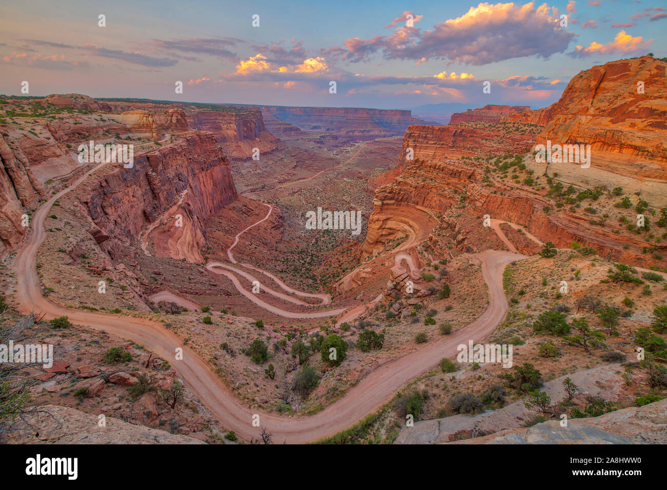 The Neck view of Shafer Trail and evening clouds, Canyonlands National ...