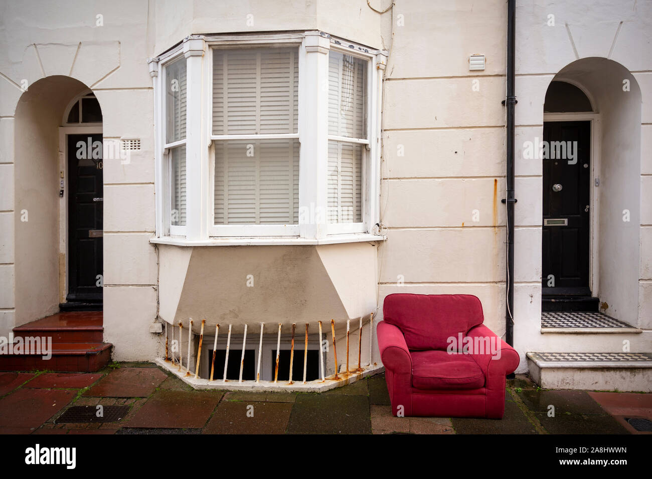 red chair on the street Stock Photo - Alamy