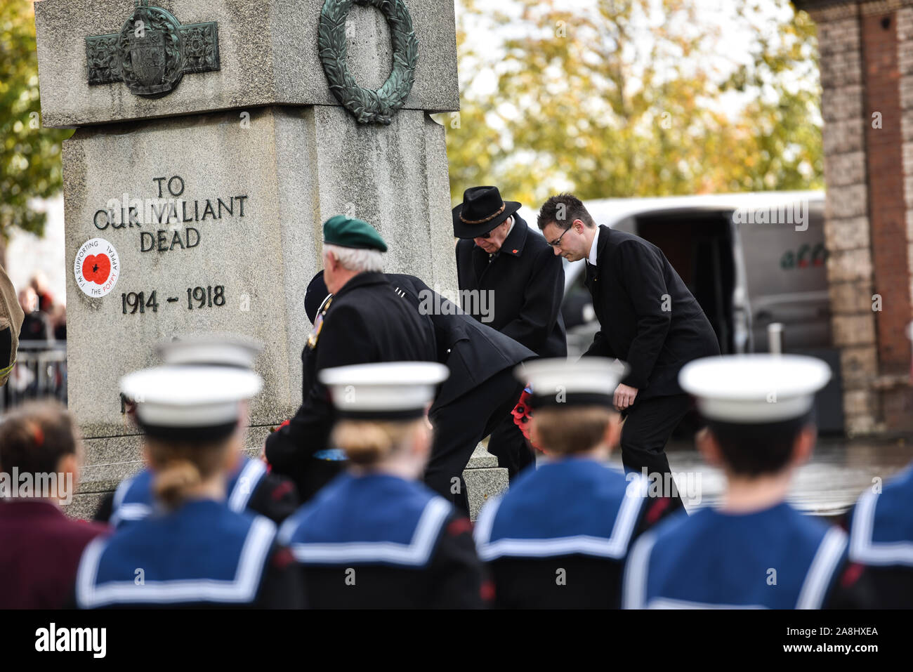 Veterans and civilians lay reefs and notes of condolence to the fallen ...