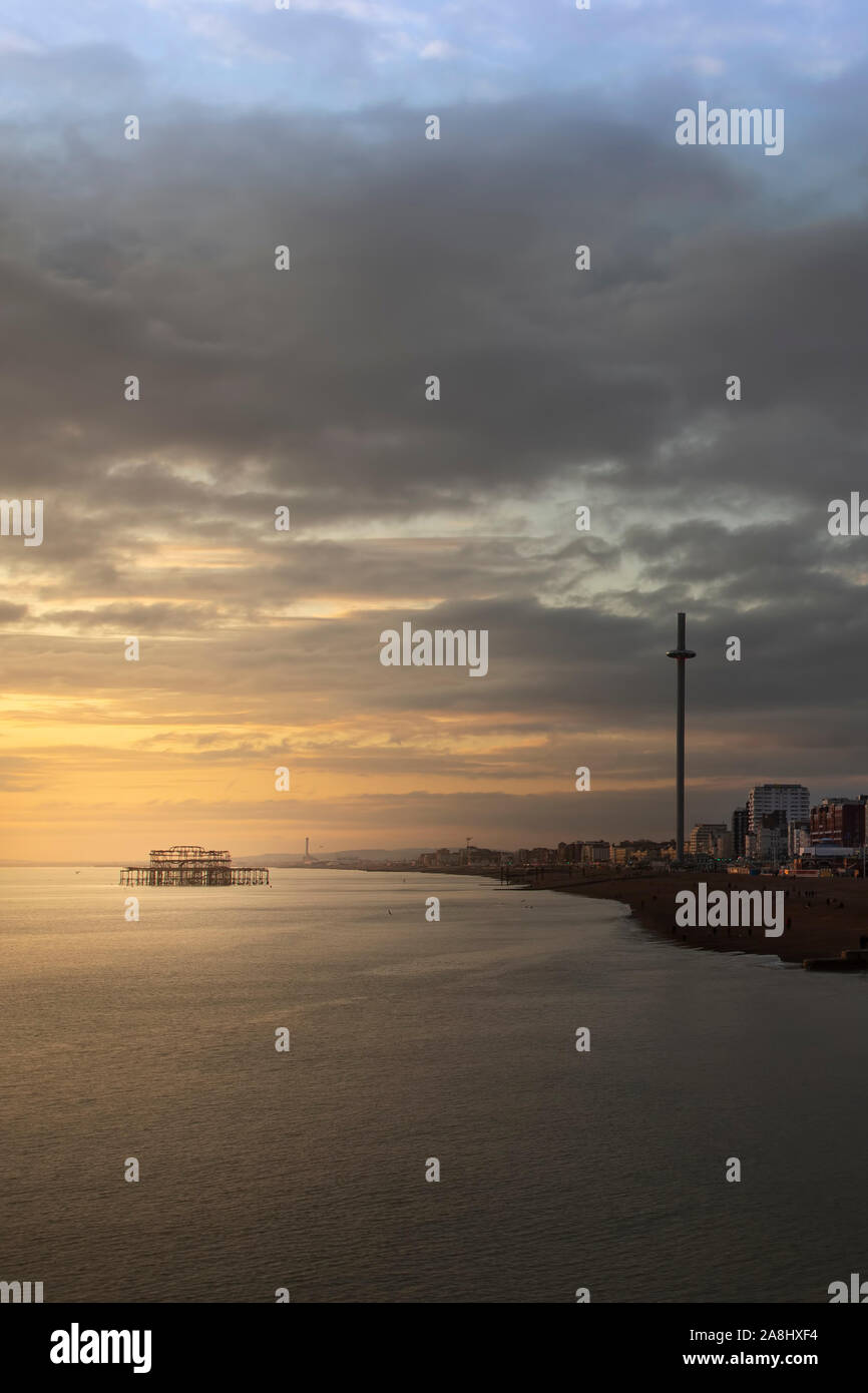 sunset lighting up brighton seafront buildings Stock Photo - Alamy