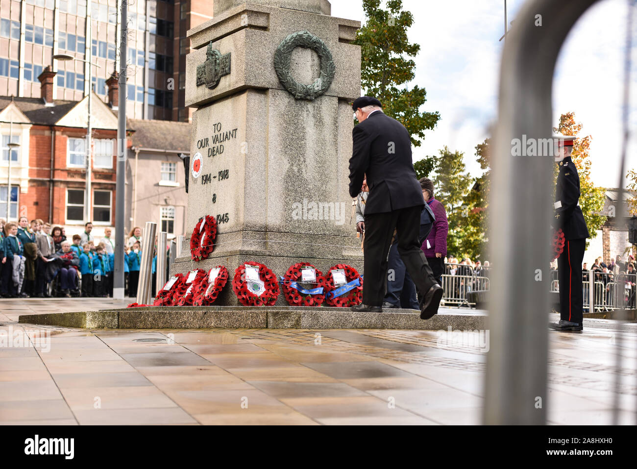 Veterans and civilians lay reefs and notes of condolence to the fallen ...