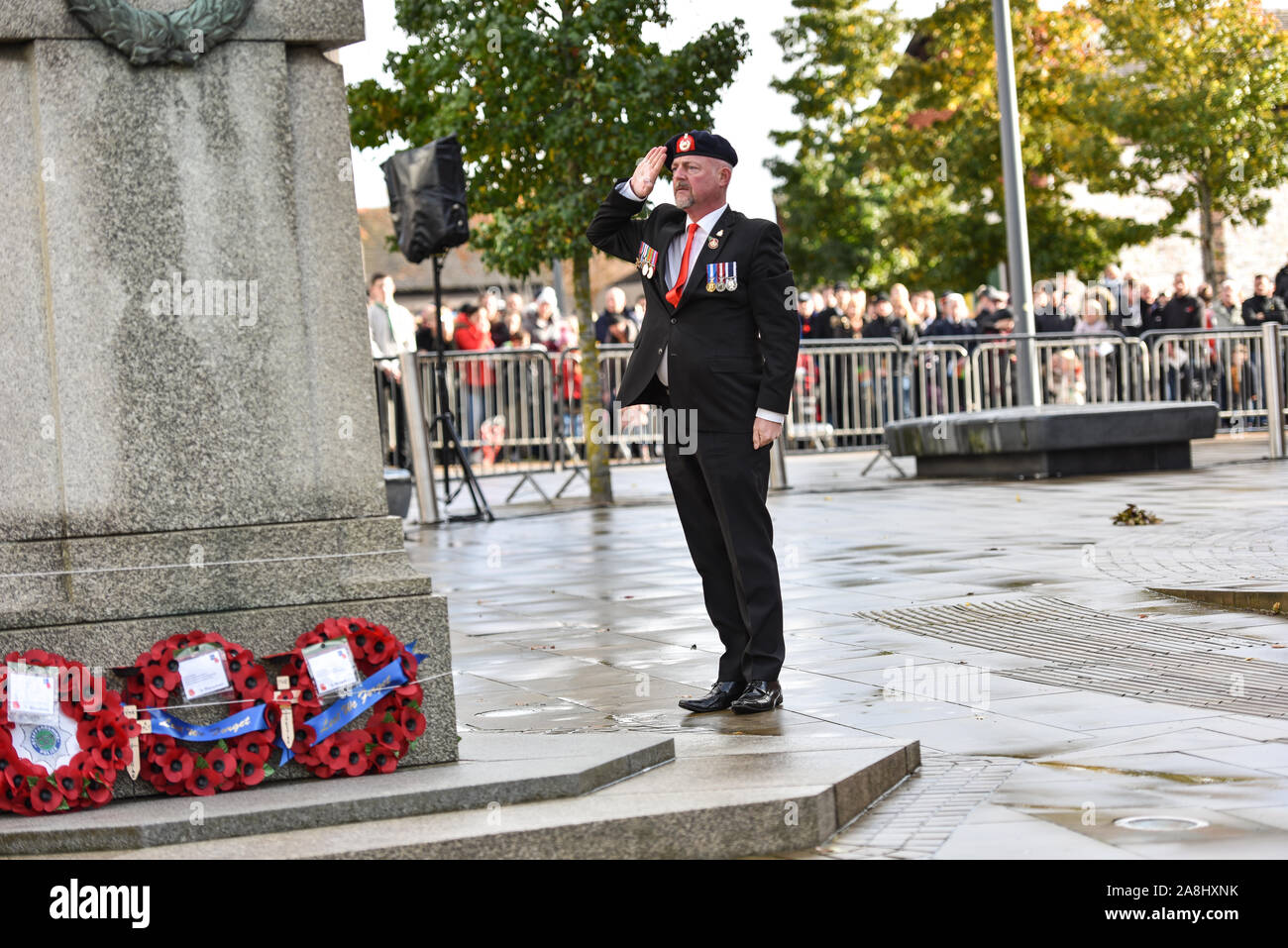 Veterans and civilians lay reefs and notes of condolence to the fallen ...