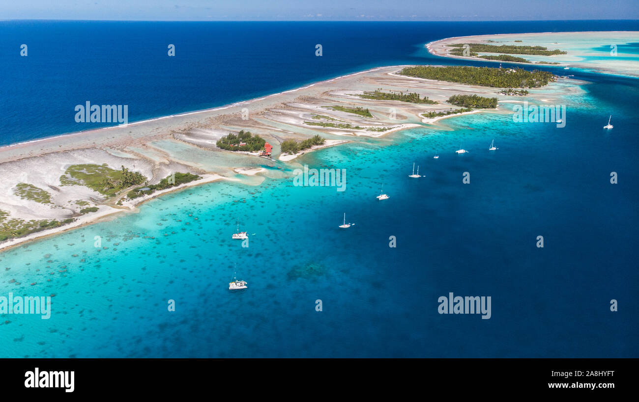 Sailing with catamaran in Tuamotu Archipelago french Polynesia - Aerial ...
