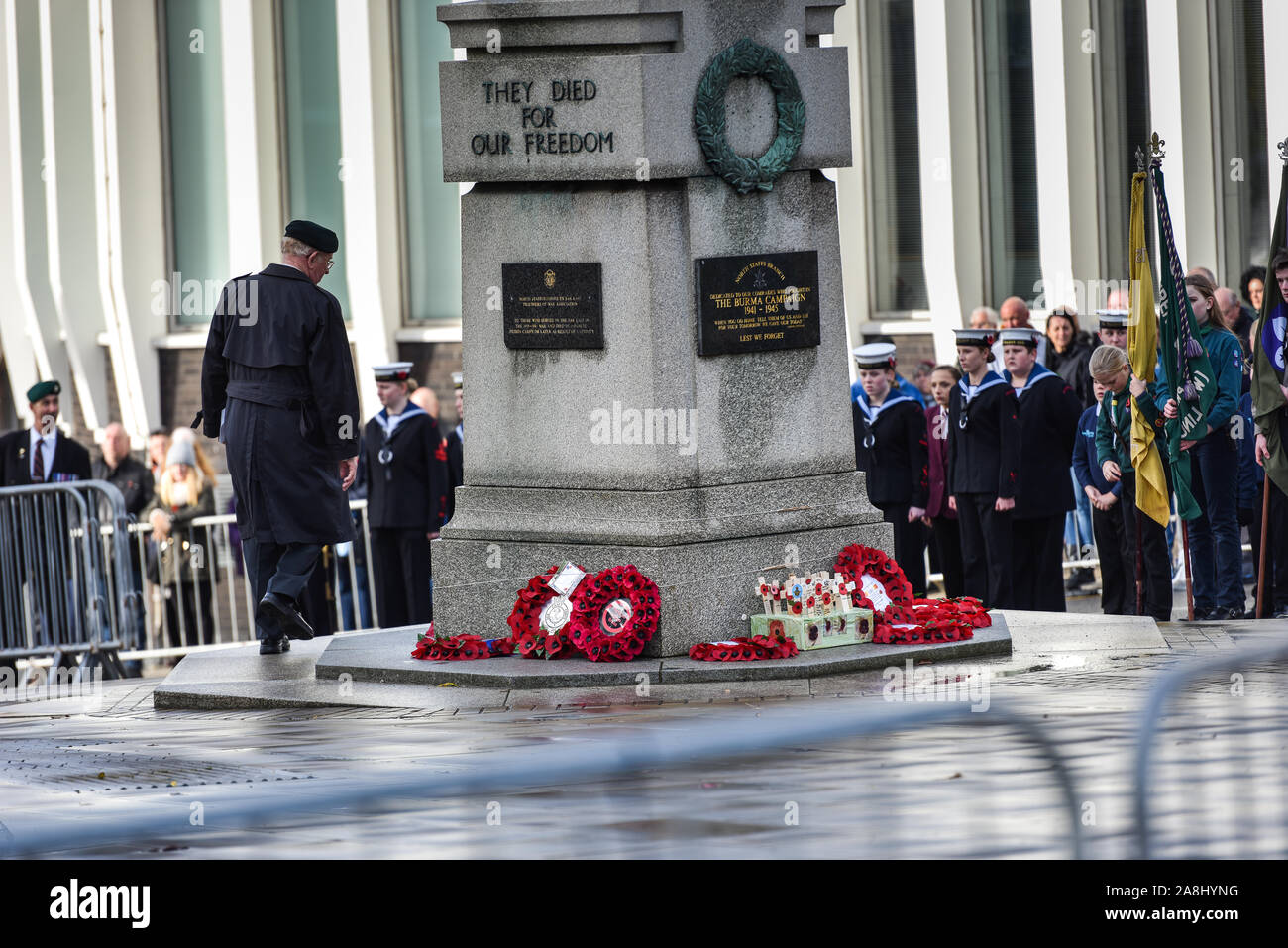 Veterans and civilians lay reefs and notes of condolence to the fallen ...